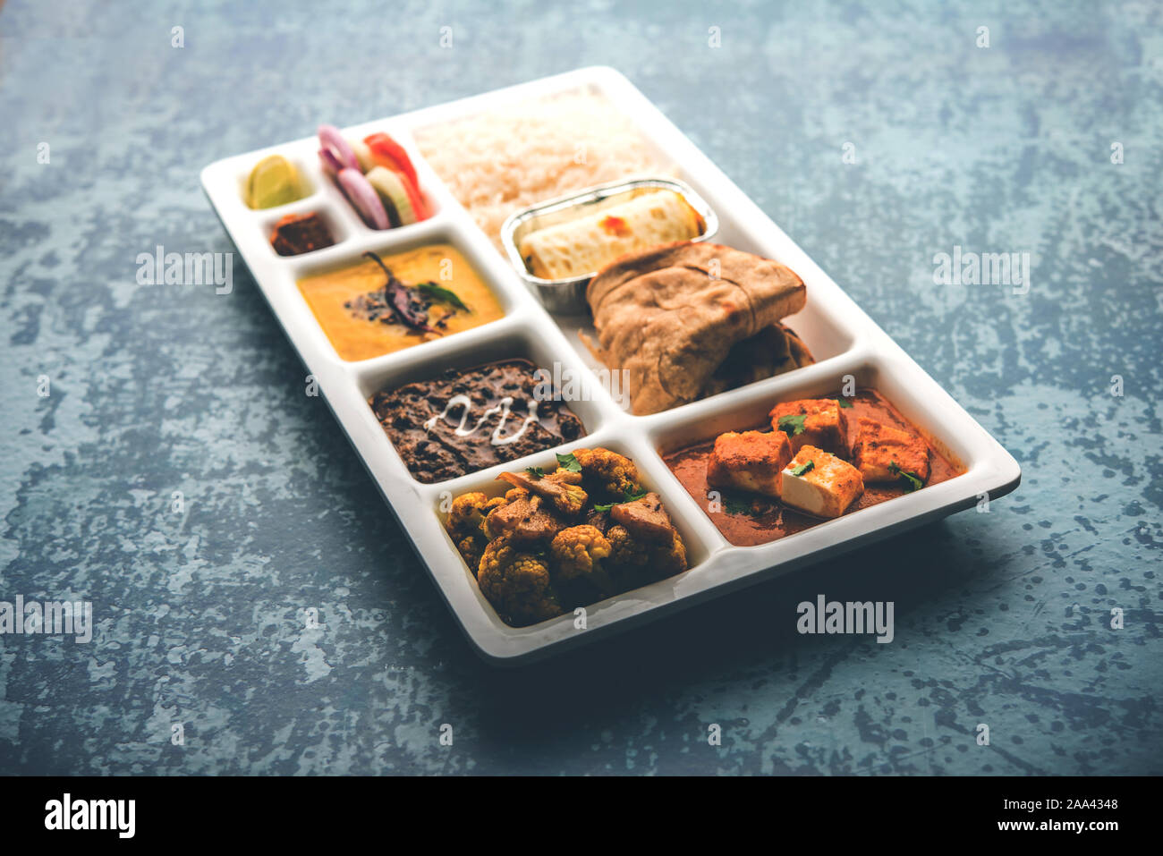 Indian vegaterian Food Thali or Parcel food-tray with compartments in ...