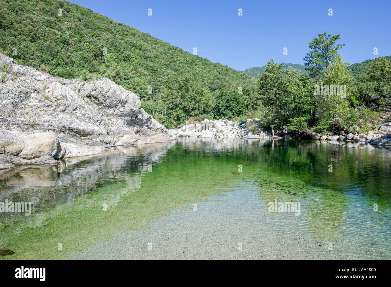 Pure and fresh water natural pool of Travu River, Corsica, France ...