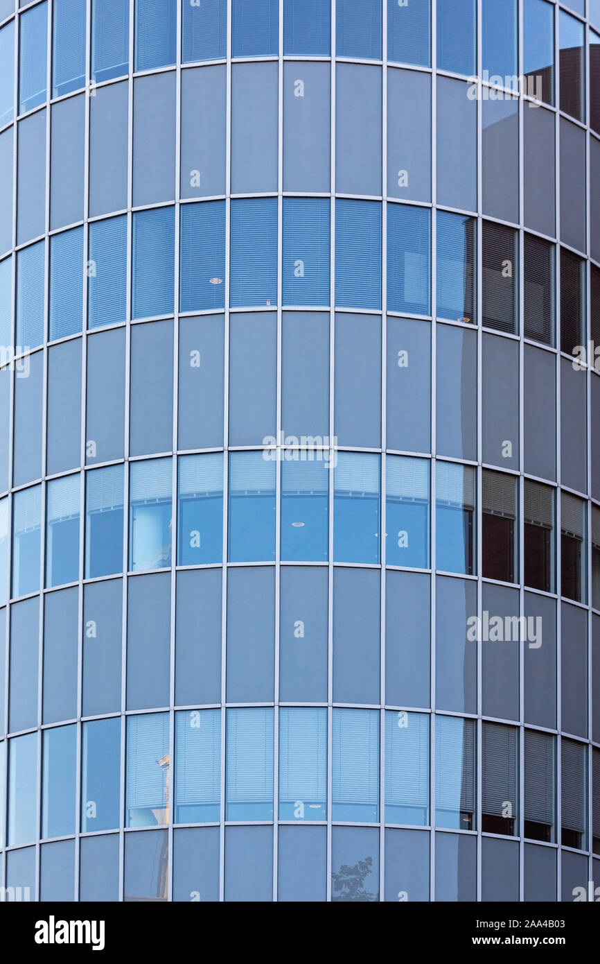 Curved Blue Glass Office Building Exterior Stock Photo - Alamy
