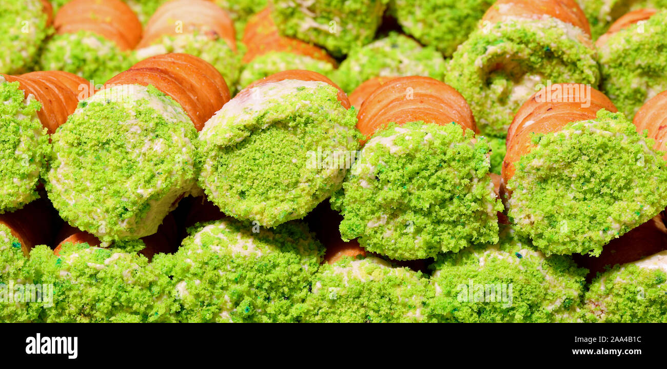many pastries with pistachios for sale at pastry shop Stock Photo - Alamy