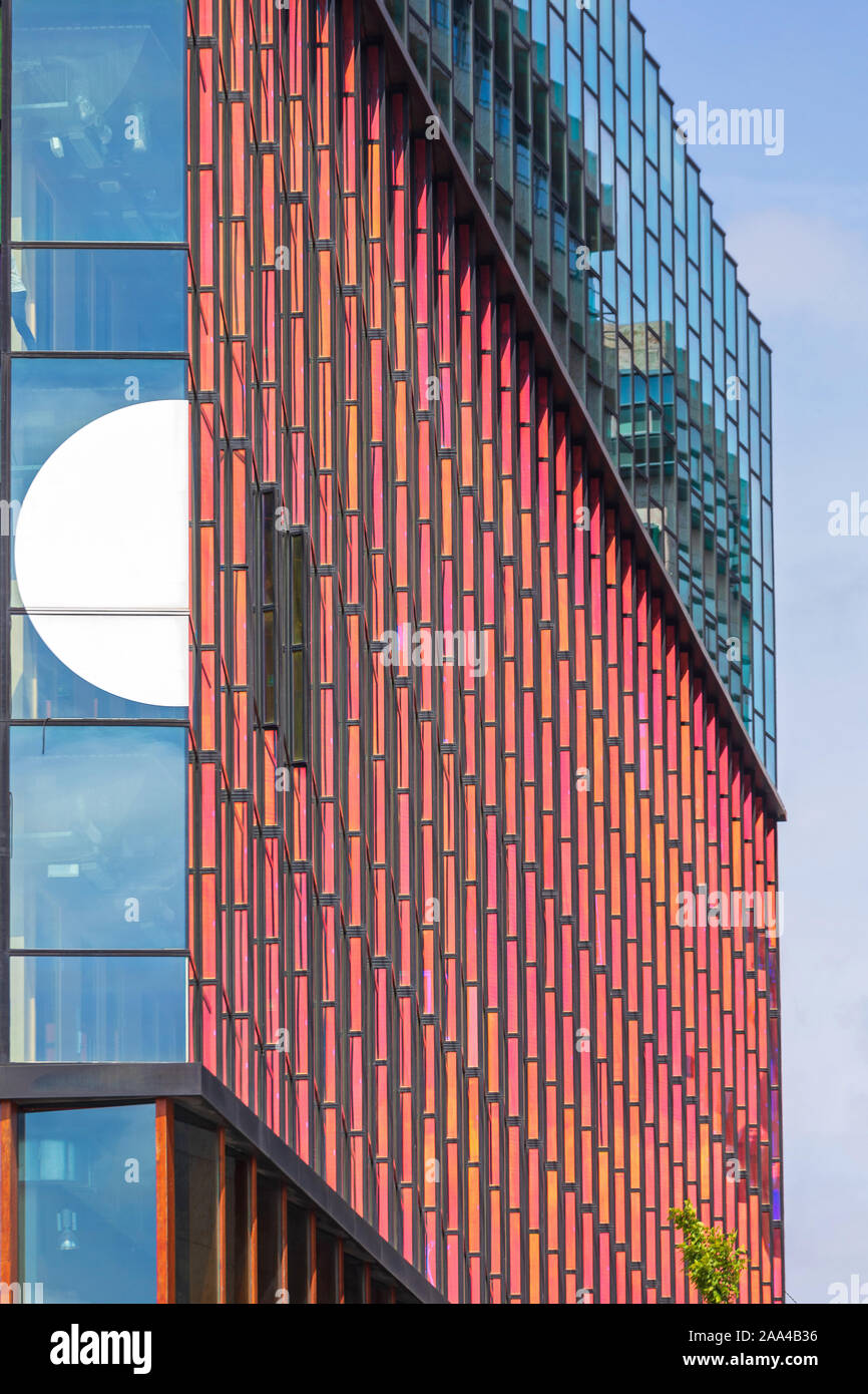 Red Glass Facade at Modern Building in Amsterdam Stock Photo - Alamy