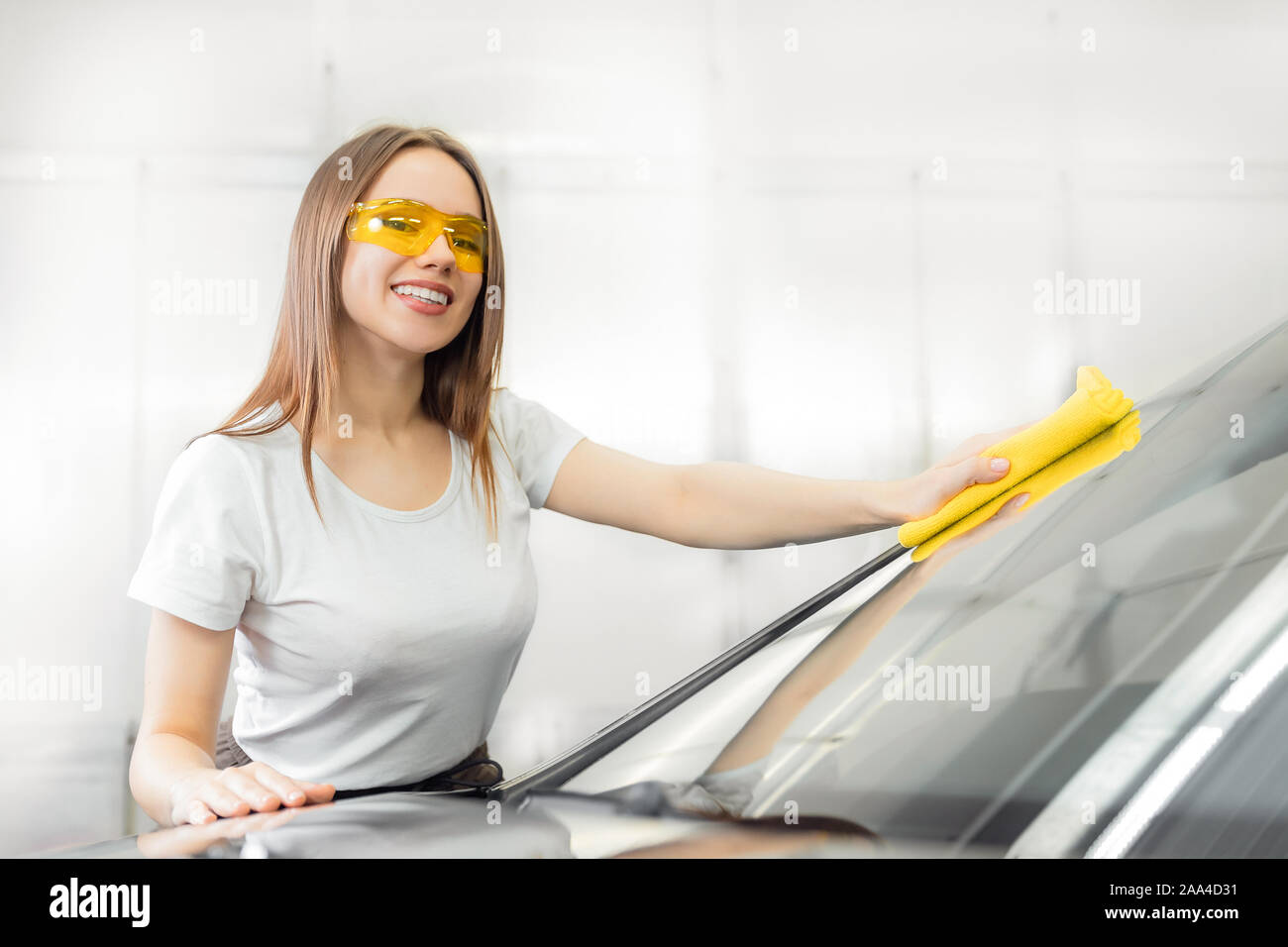 Smiling adult girl washing hi-res stock photography and images - Alamy