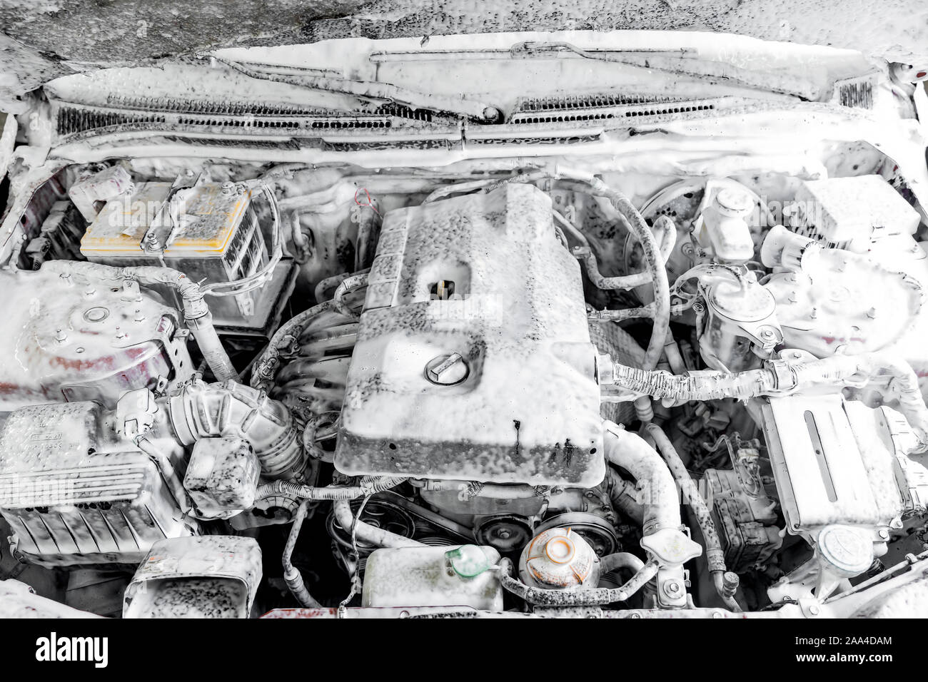 Car service detailing wash, background engine in white foam for ...