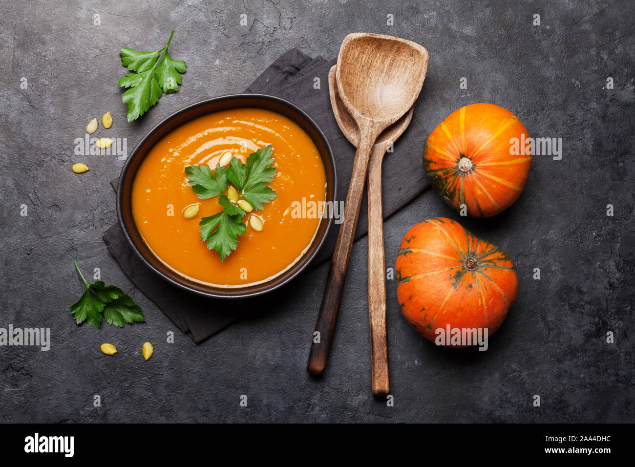 Pumpkin vegetable soup on stone backdrop. Top view. Flat lay Stock ...