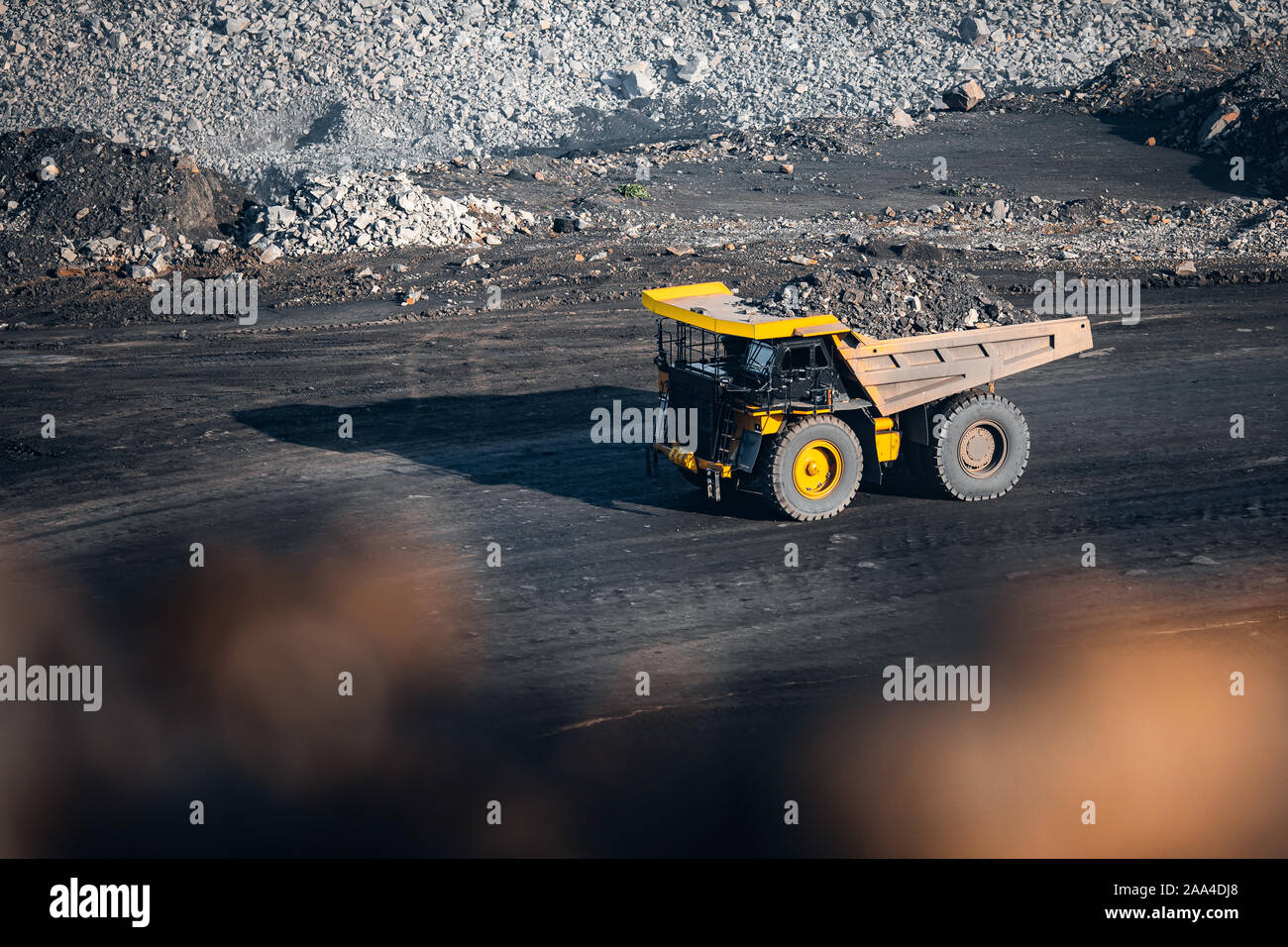 Big yellow mining truck for anthracite. Open pit mine, extractive ...