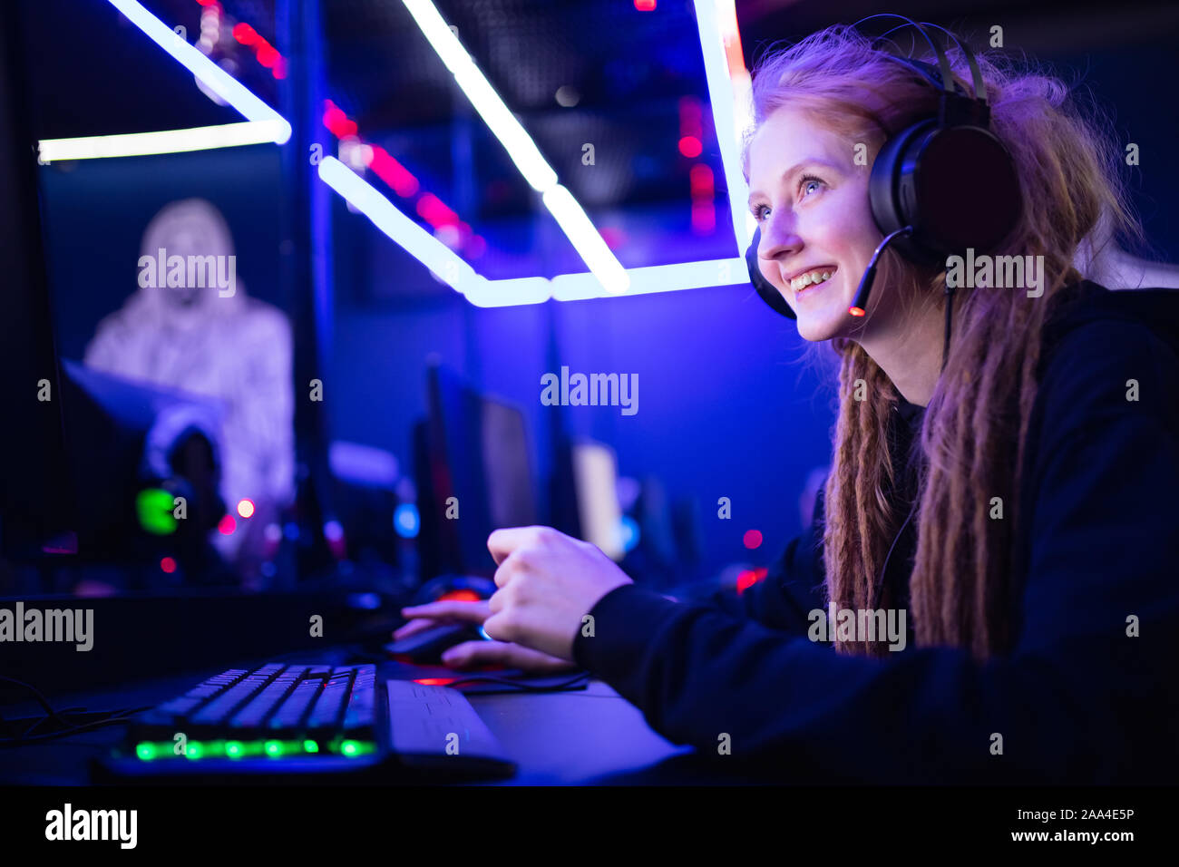 Streamer beautiful girl smiles professional gamer playing online games ...