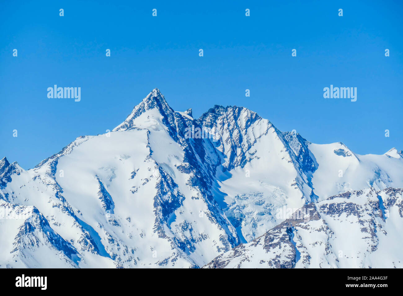 Austria tallest mountain, Grossglockner seen from Heiligenblut. The mountain range is completely ...