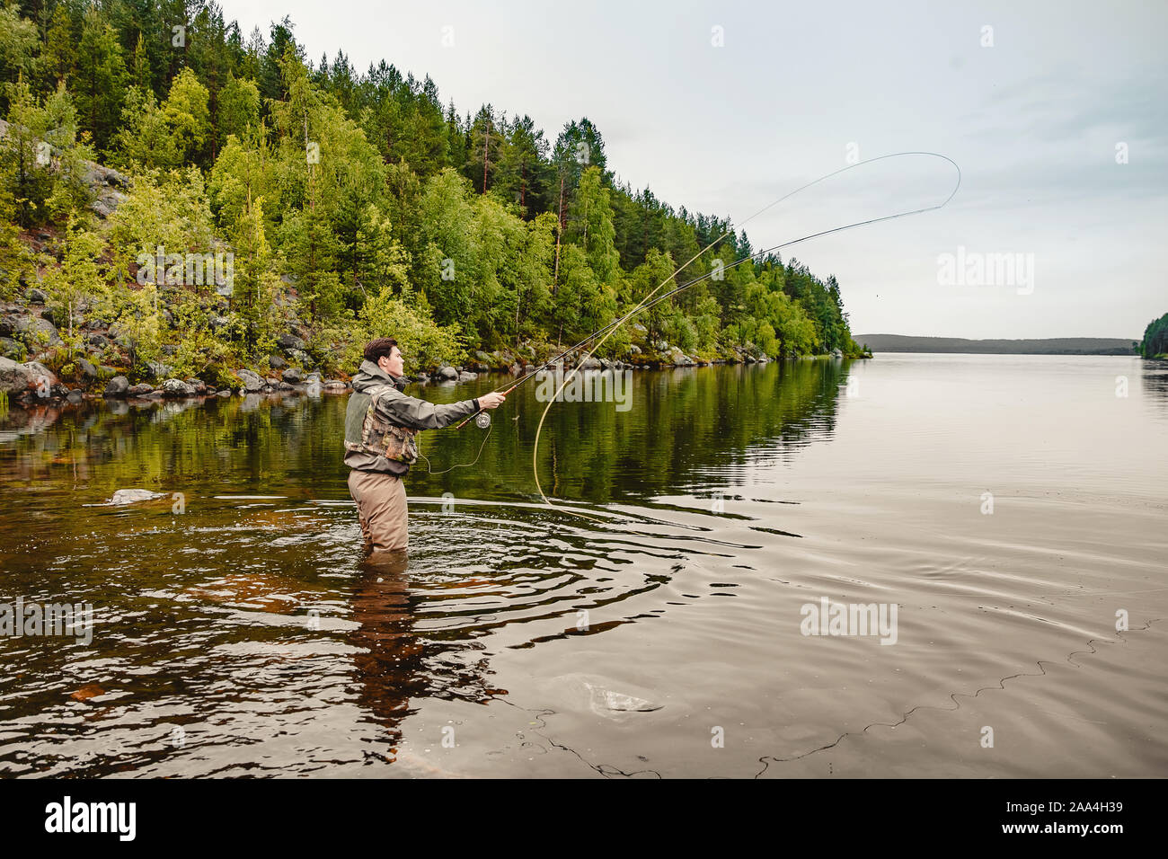 Technique for fly fishing in mountain river, instructions Stock Photo ...