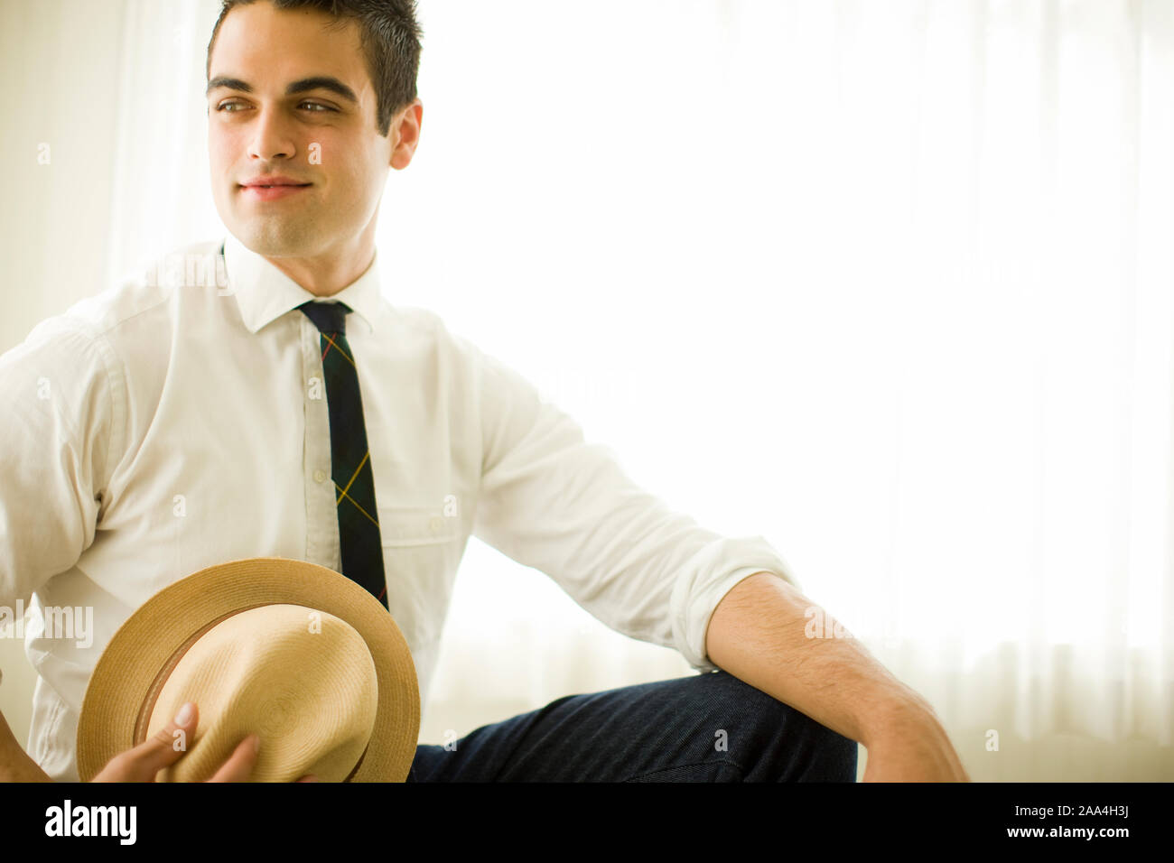 Attractive young man fedora hi-res stock photography and images - Alamy