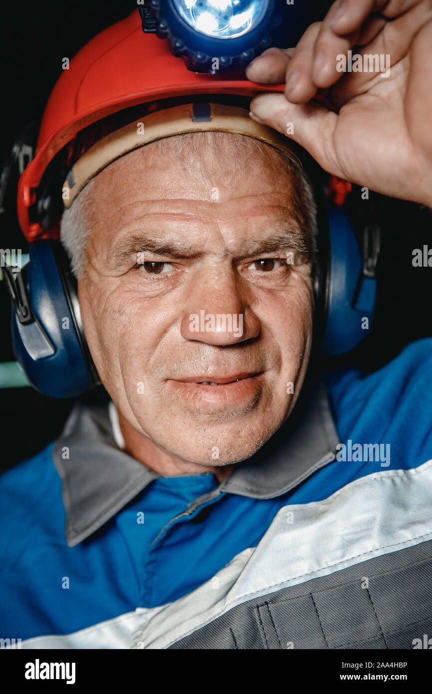 Portrait happy man miner after working in coal mine, dirty face in ...