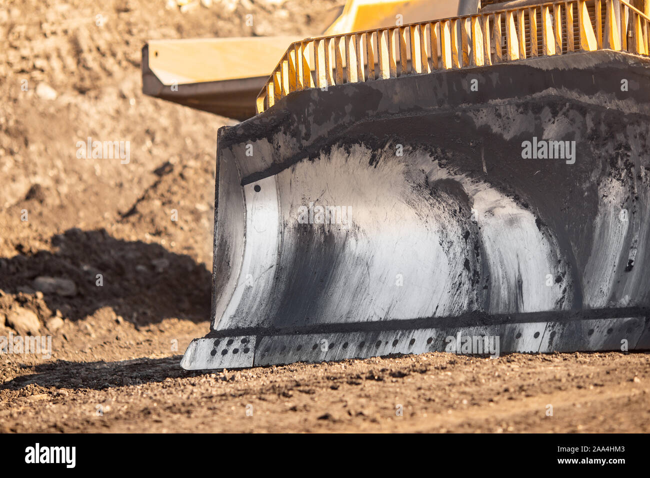 Close up of an iron excavator bulldozer bucket with parts soil for ...