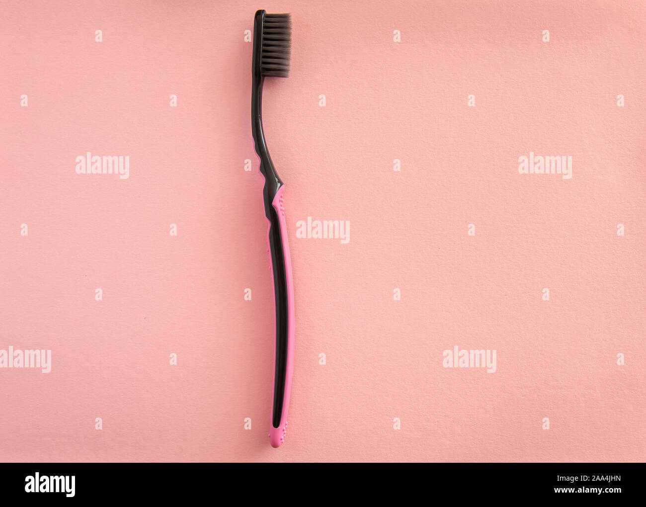 Toothbrush for brushing teeth on pink background, pastel colors Stock ...