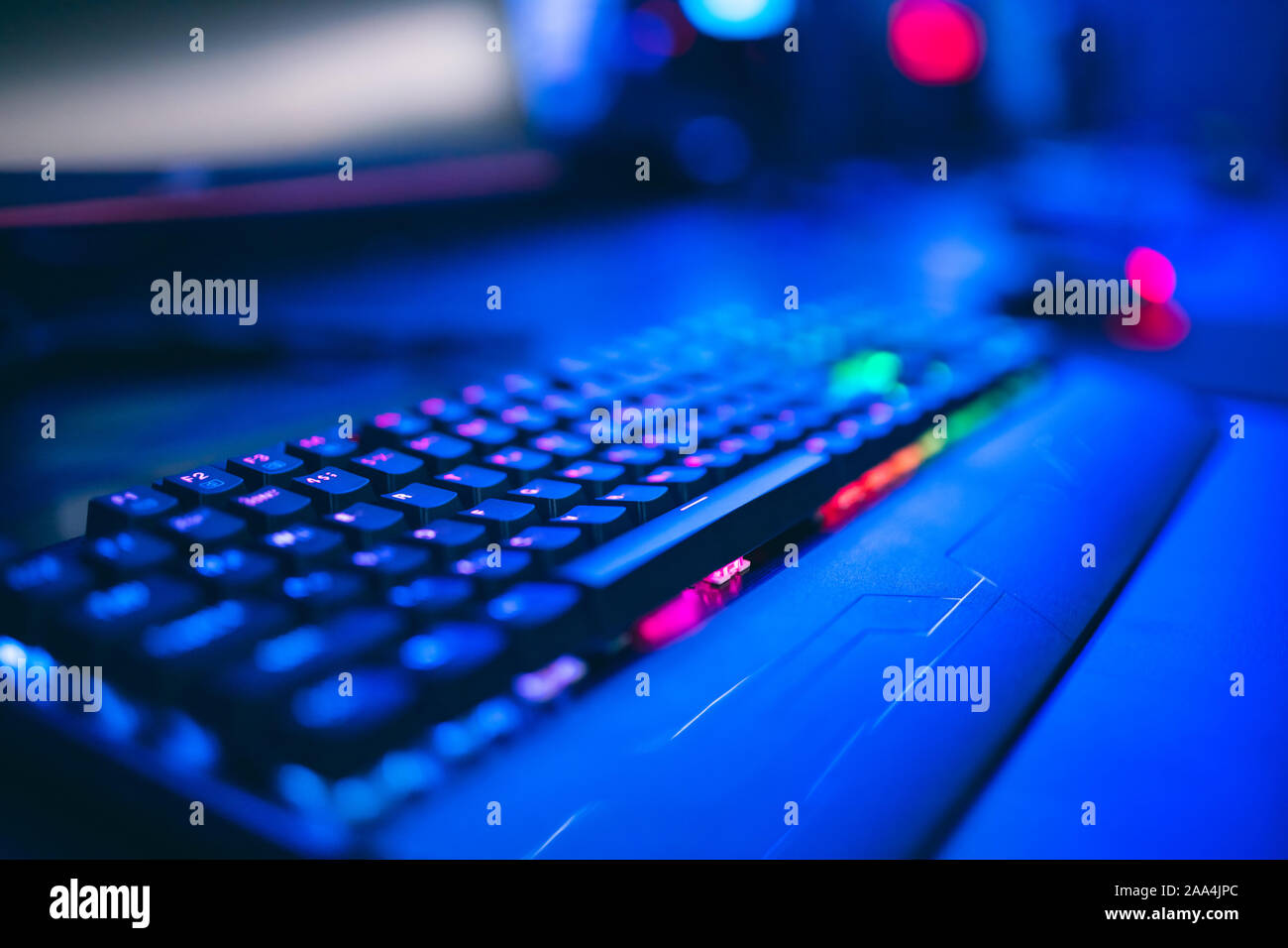 Professional mechanical keyboard for online gamers, blue background ...