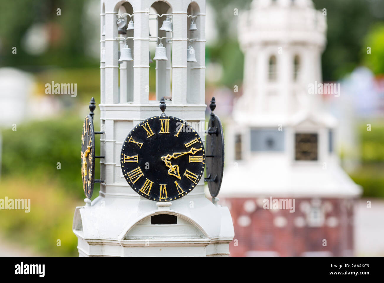 Old clock tower closeup, miniature scene Stock Photo - Alamy