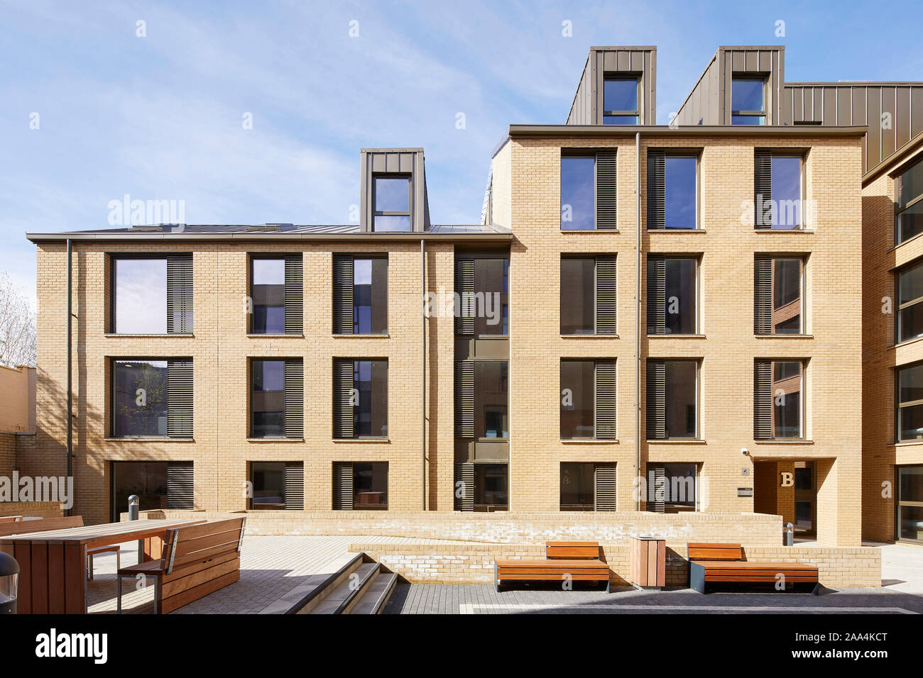 Front elevation of brick facade with large windows. Anglia House ...