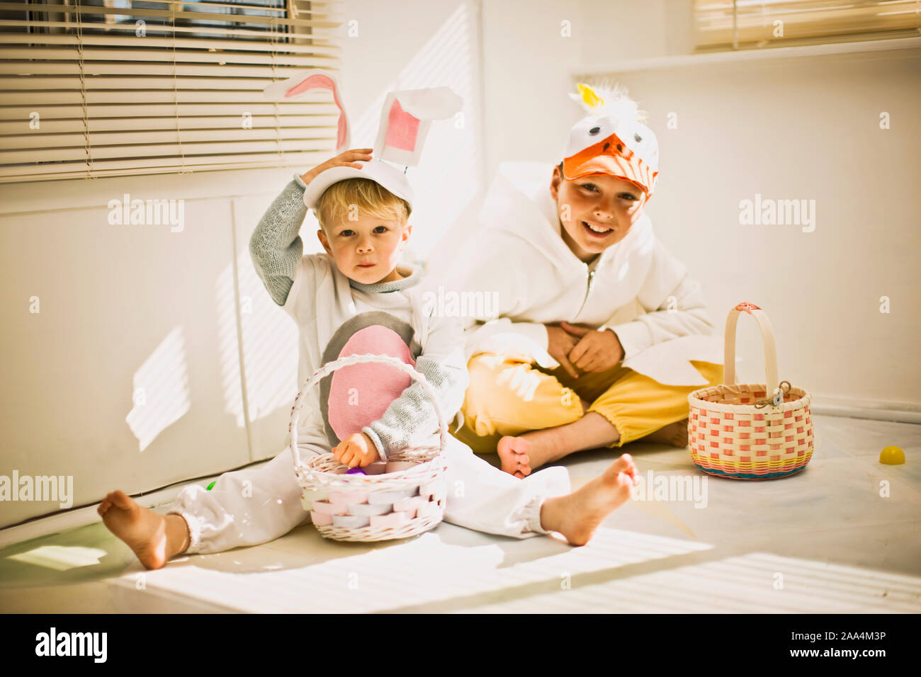 Two brothers dressed up for Easter with their Easter baskets Stock ...