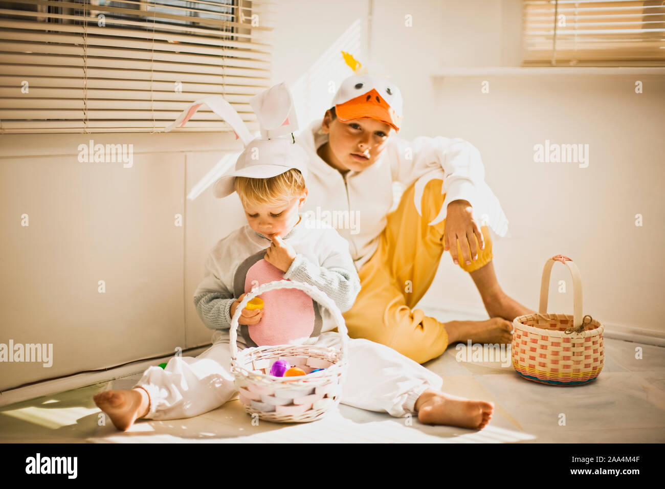 Two brothers dressed up for Easter with their Easter baskets Stock ...