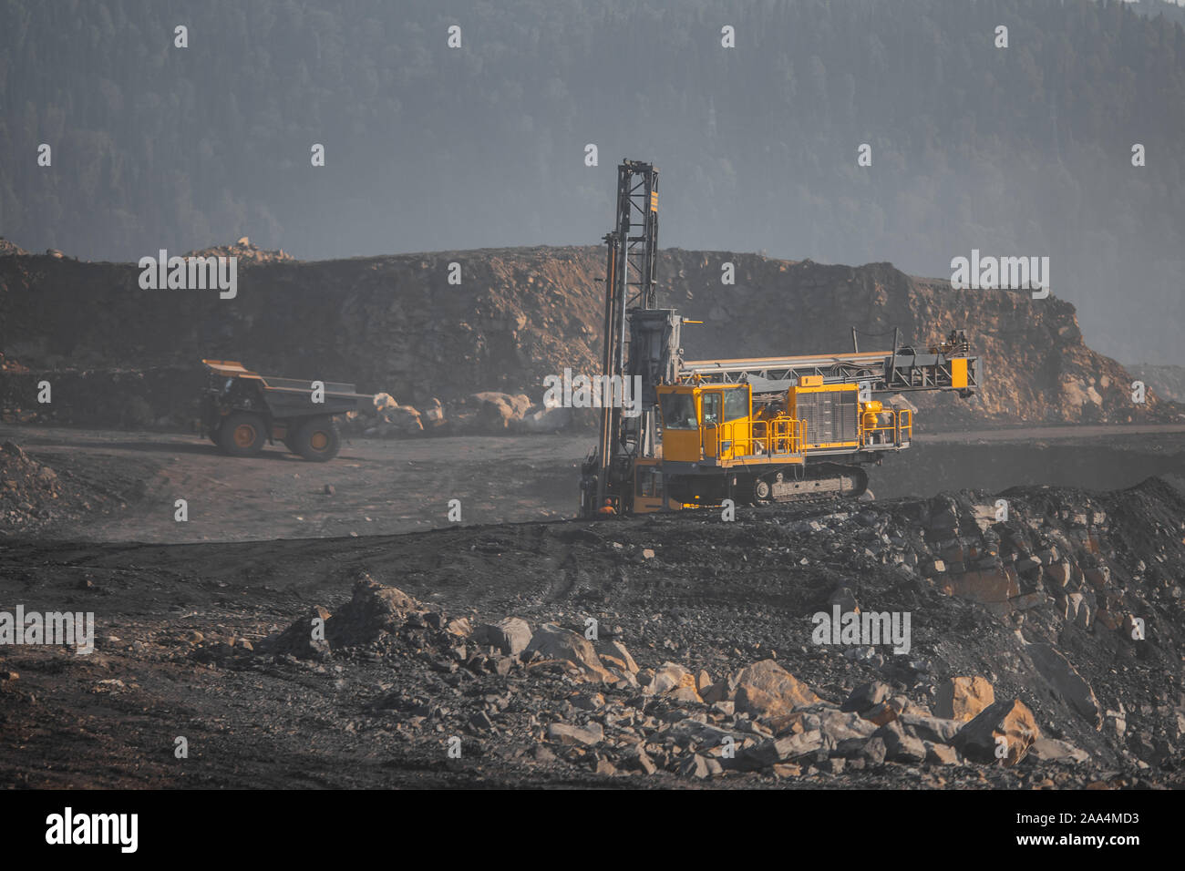 Open mine coal and minerals from bowels soil explosion. Drilling rigs ...