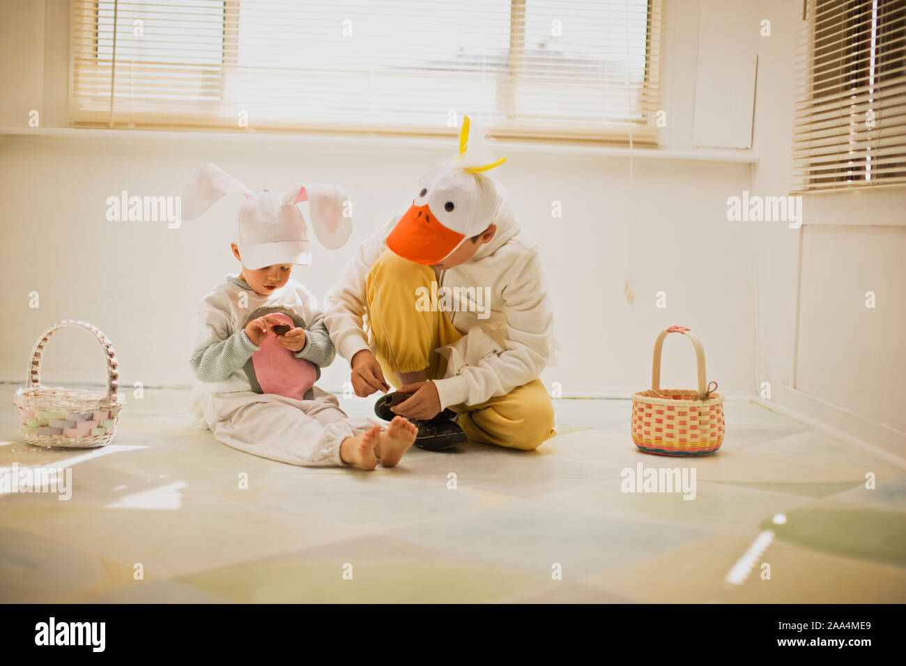 Two brothers dressed up for Easter with their Easter baskets Stock ...