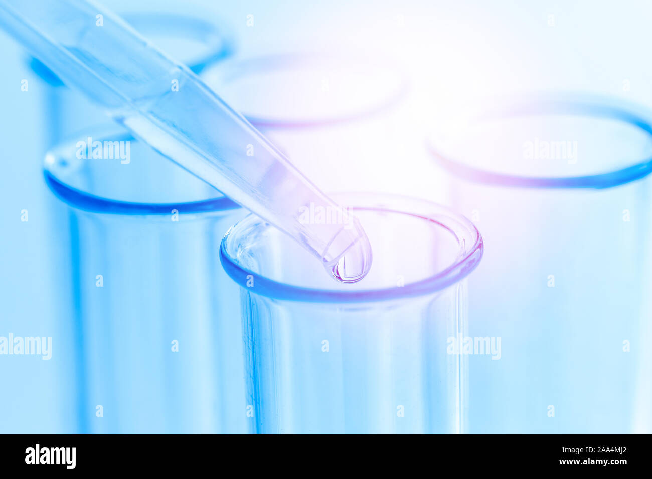 Science laboratory test blue tubes, macro flask equipment. Chemical ...