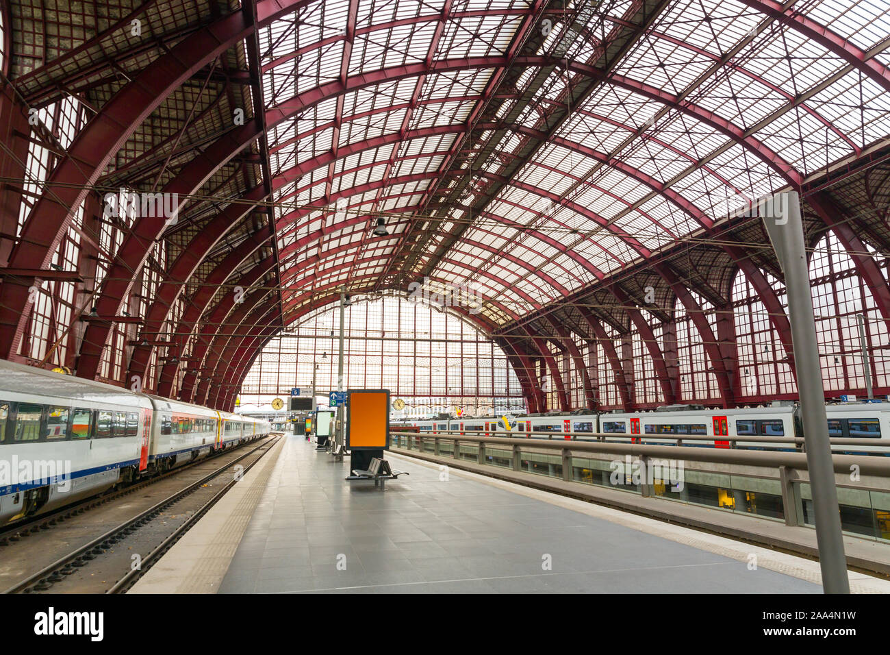 Train on railway station platform, Europe Stock Photo - Alamy