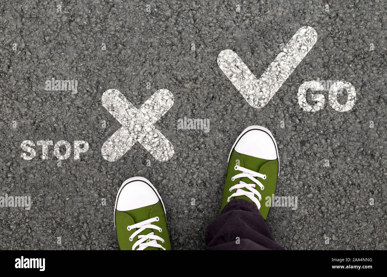 Moving Forward, Stop Or Go. Boy in green shoes has decision to make ...