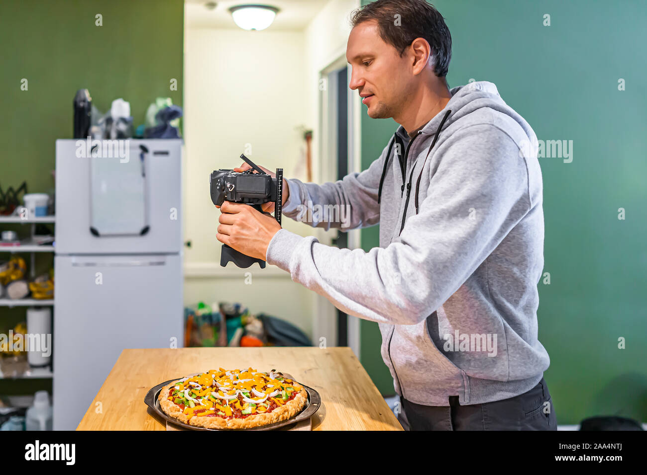 Man professional photographer taking flat top picture with camera of ...