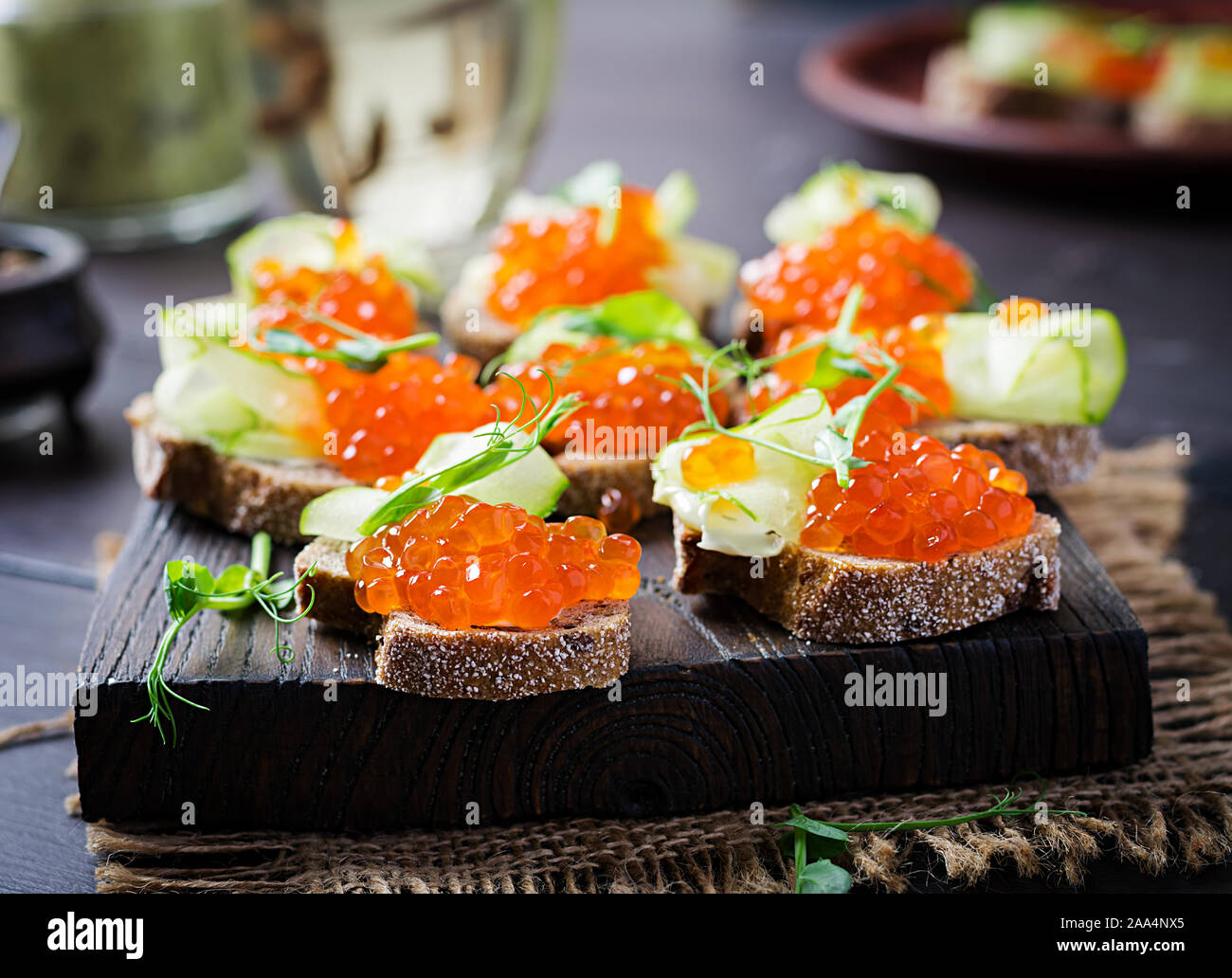 Canape with salmon red caviar. Sandwich for lunch. Delicious food Stock ...