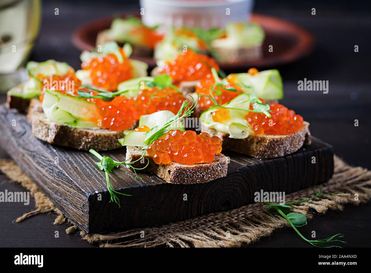 Canape with salmon red caviar. Sandwich for lunch. Delicious food Stock ...