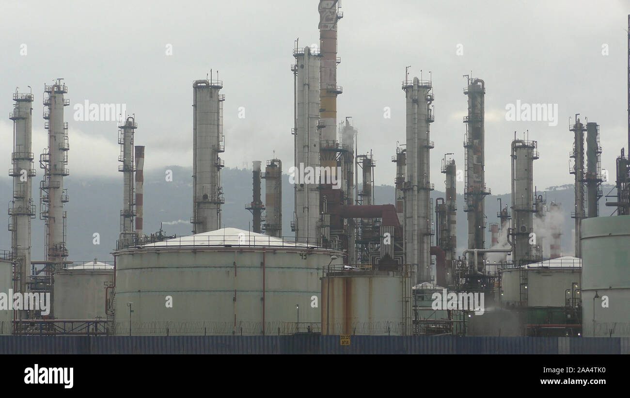 Acid rain, air emissions from an oil refinery. Smoke and pollution come ...