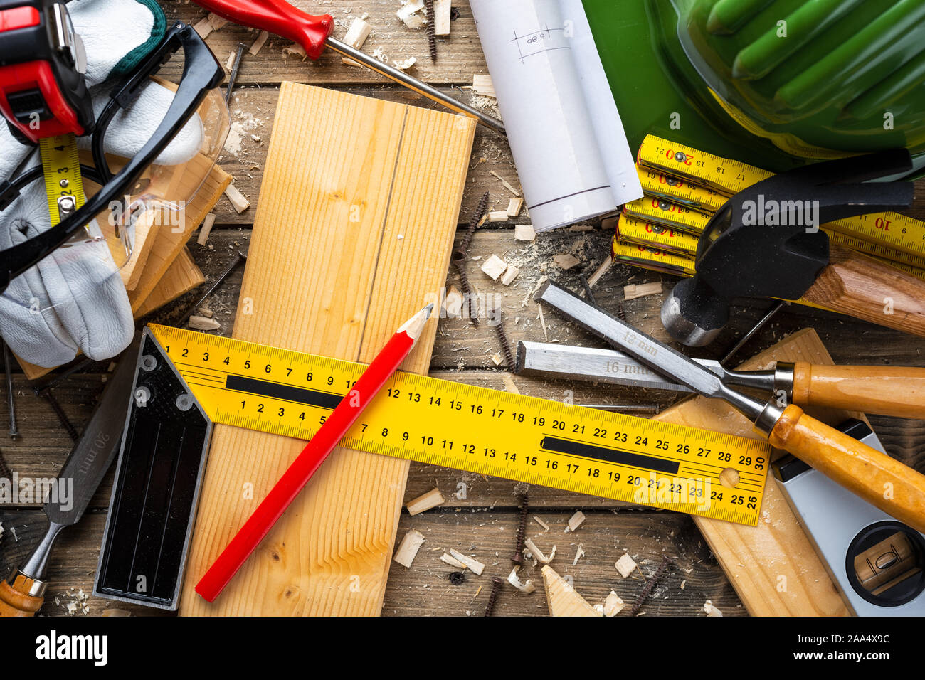 Top view of carpenter's tools on a wooden work table. Construction ...