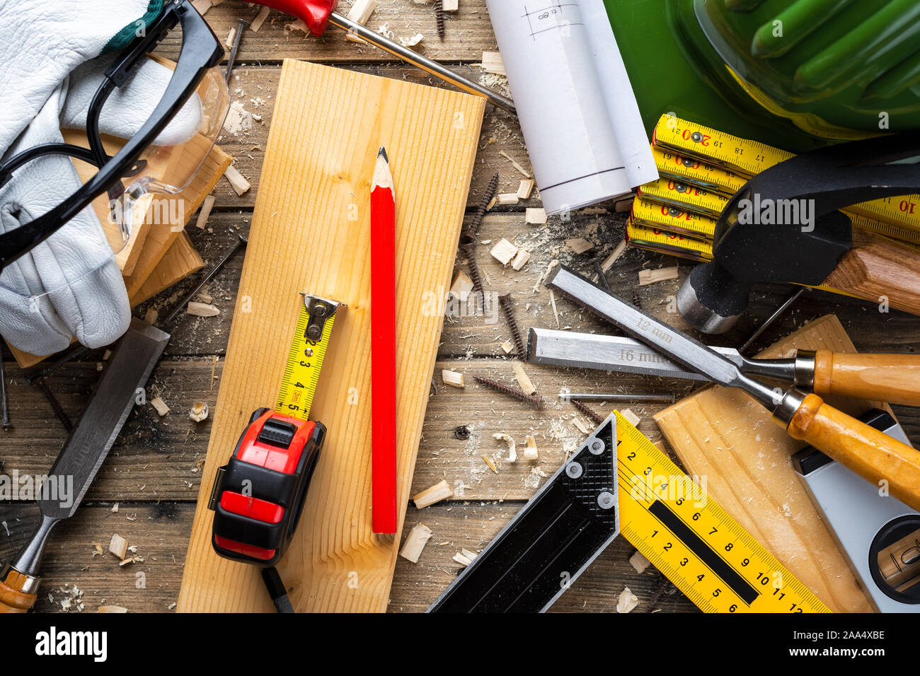 Top view of carpenter's tools on a wooden work table. Construction ...