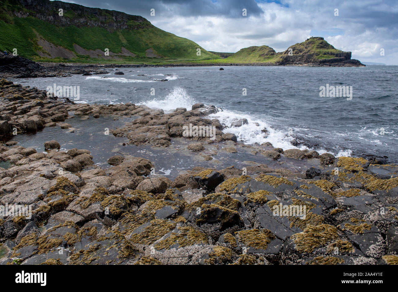 People visiting the Giants Causeway in County Antrim, Northern Ireland ...