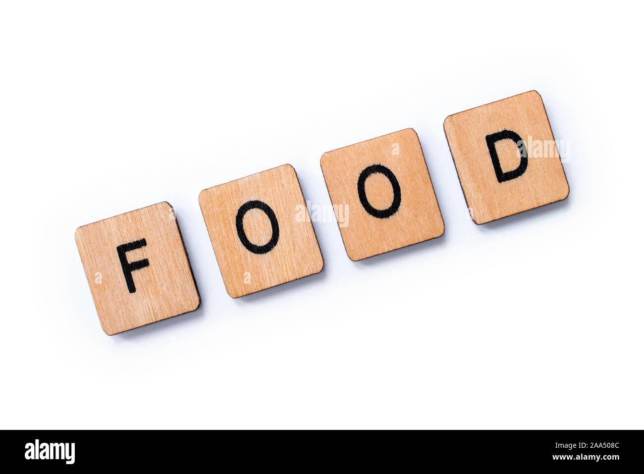 The word FOOD, spelt with wooden letter tiles over a white background ...