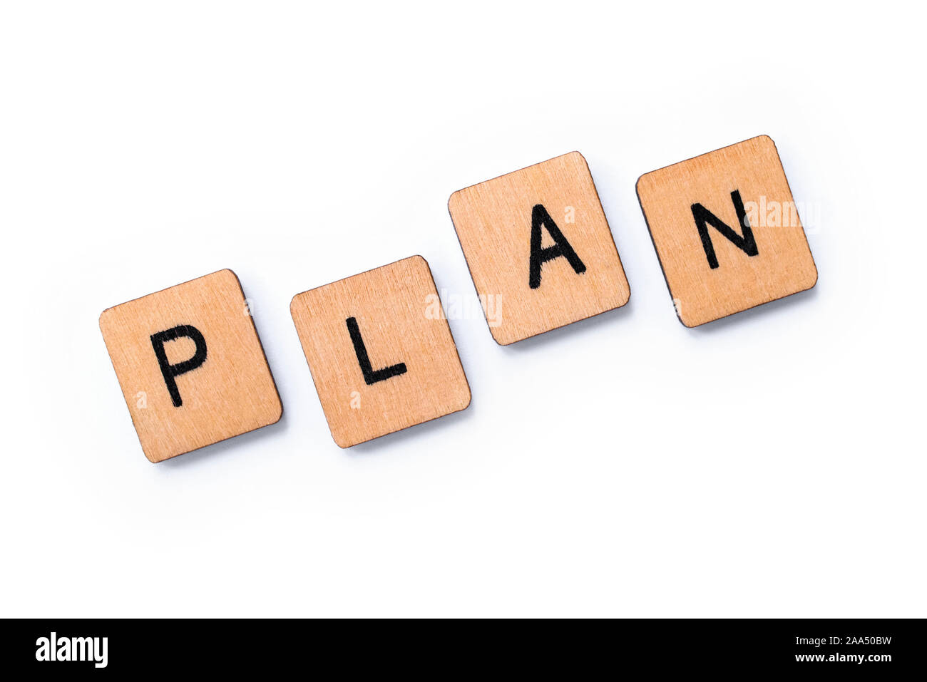 The word PLAN, spelt with wooden letter tiles over a white background Stock Photo - Alamy