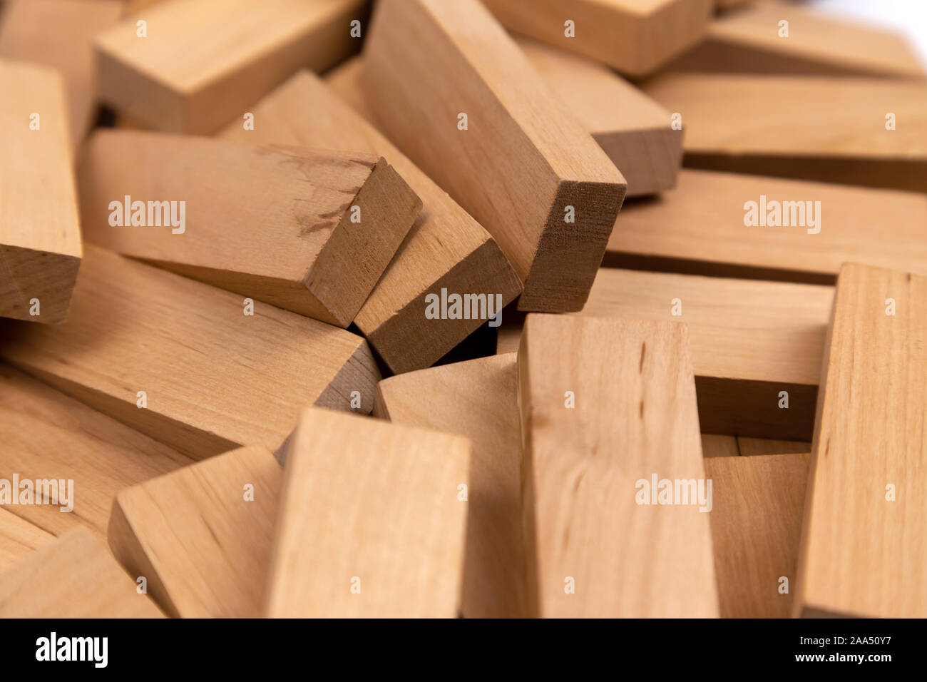 The texture of a pile of wooden blocks that lie randomly. Background ...