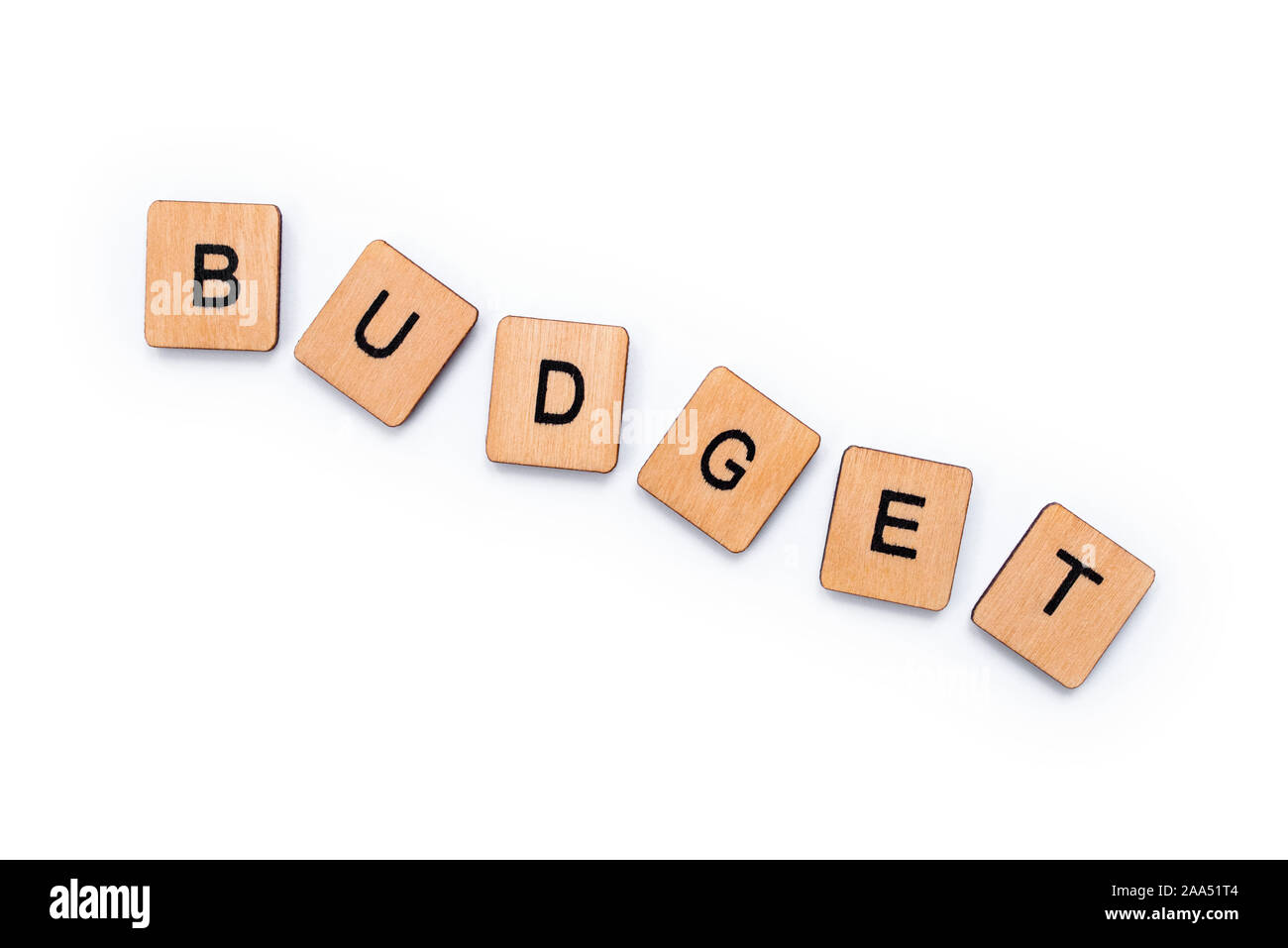 The word BUDGET, spelt with wooden letter tiles over a white background ...