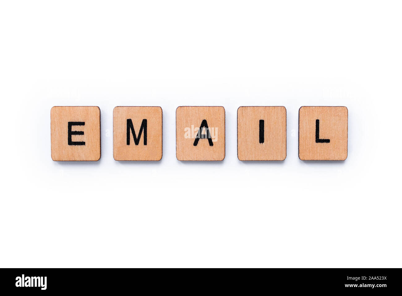 The word EMAIL, spelt with wooden letter tiles over a white background ...