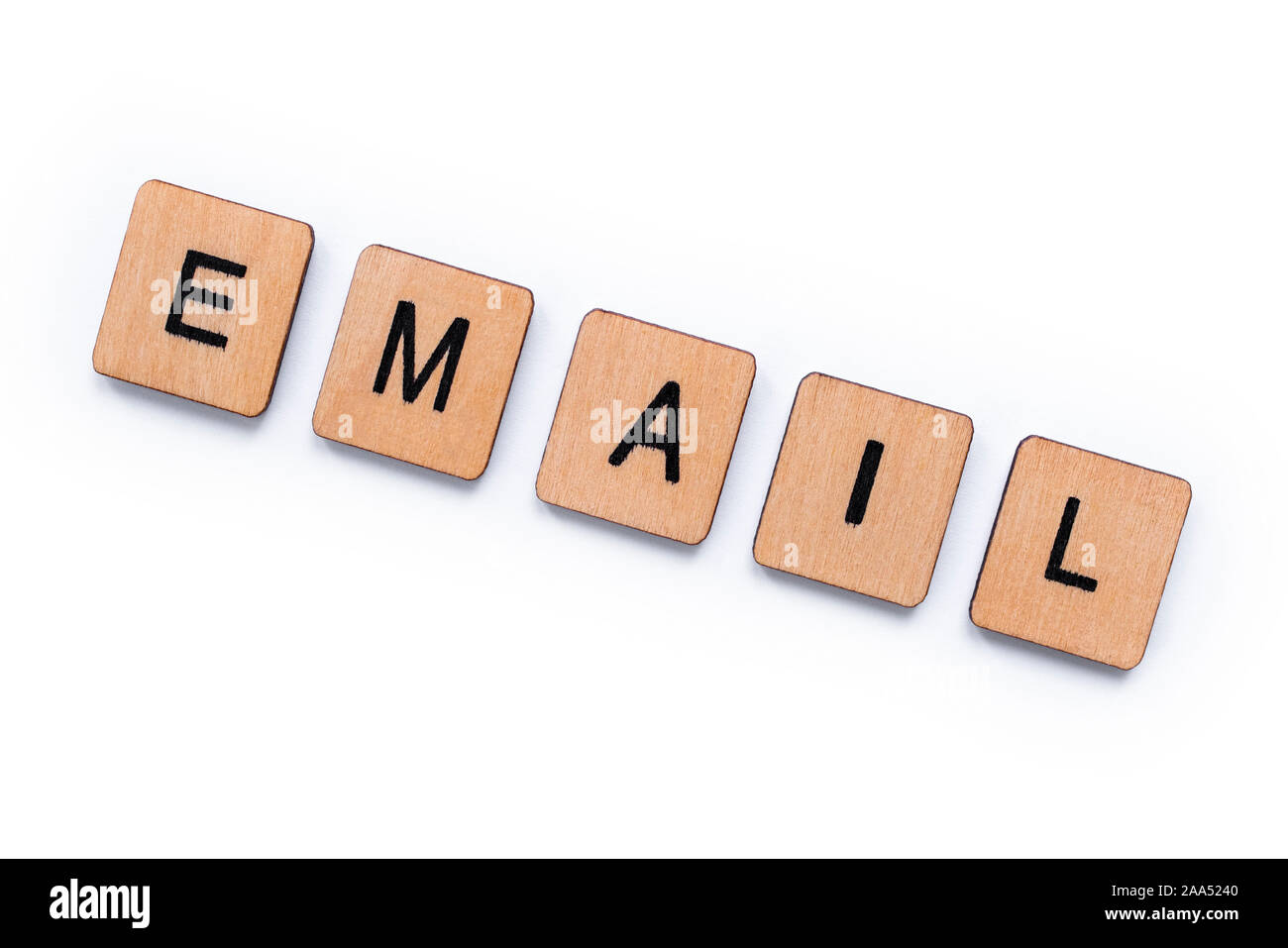 The word EMAIL, spelt with wooden letter tiles over a white background ...