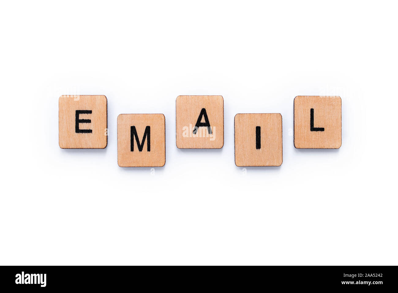 The word EMAIL, spelt with wooden letter tiles over a white background ...