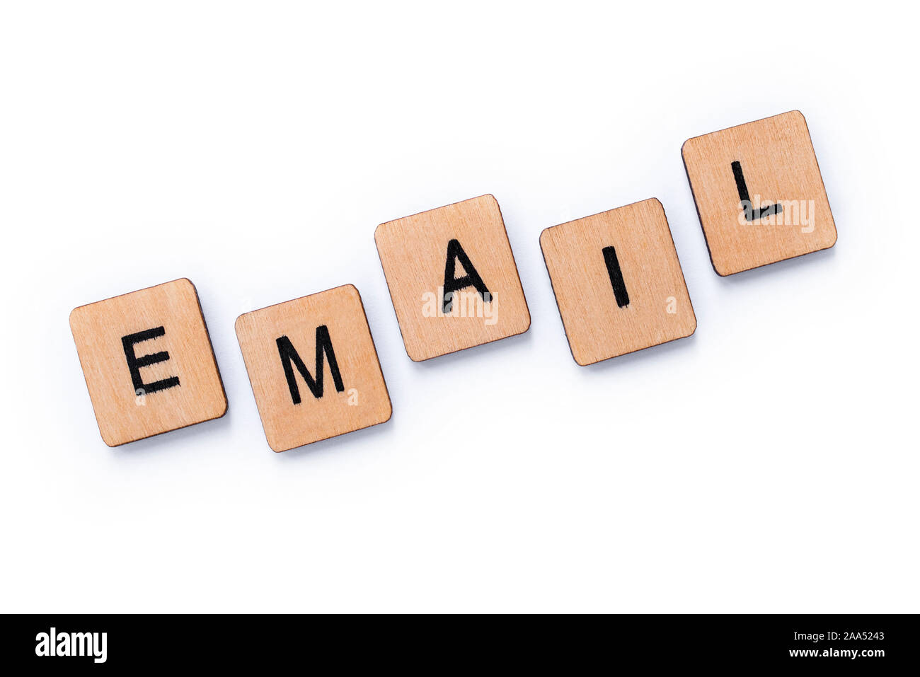 The word EMAIL, spelt with wooden letter tiles over a white background ...