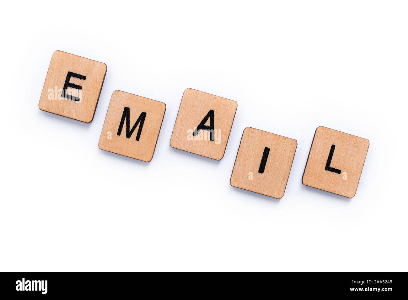 The word EMAIL, spelt with wooden letter tiles over a white background ...