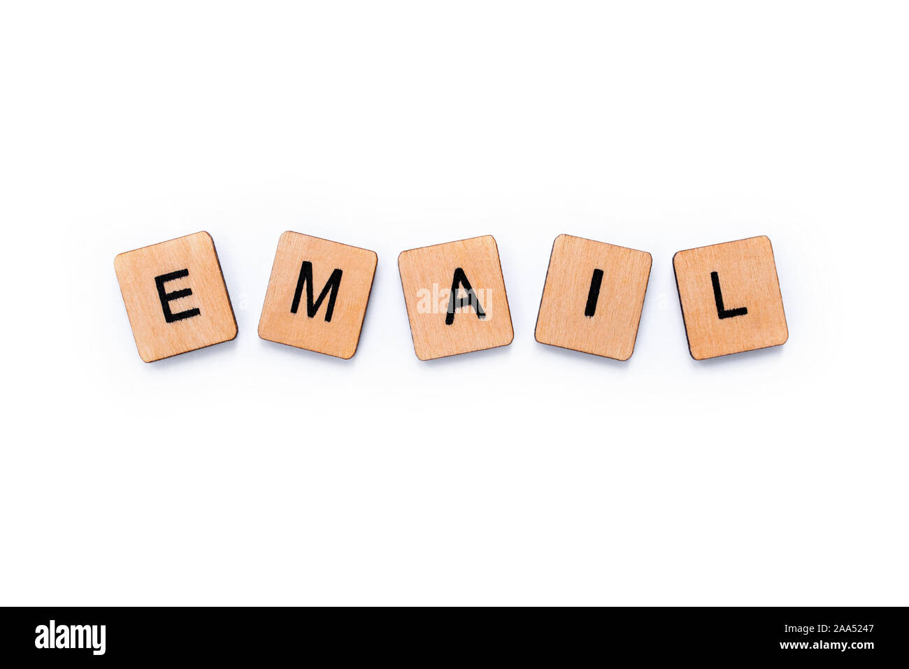 The word EMAIL, spelt with wooden letter tiles over a white background ...