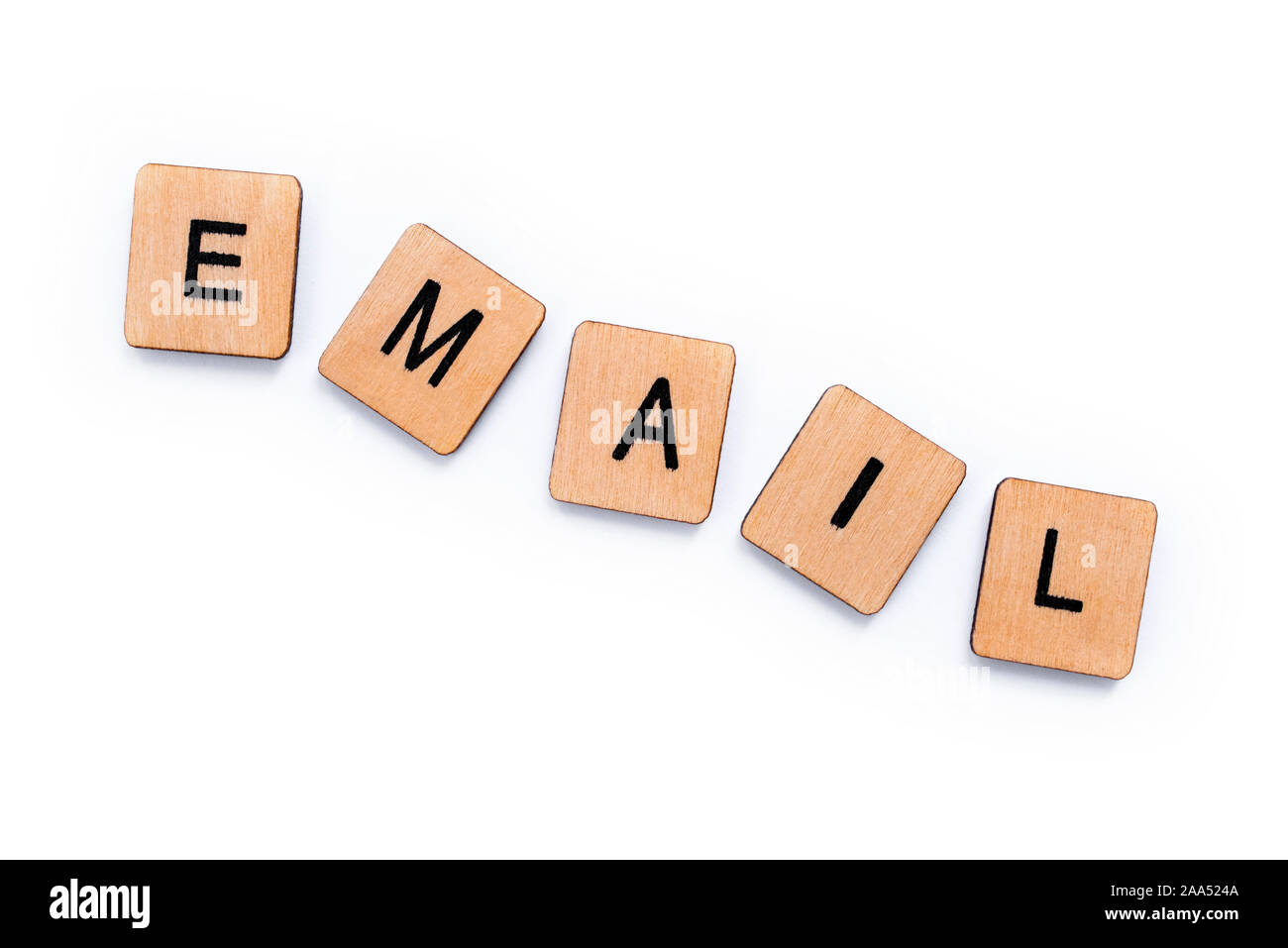 The word EMAIL, spelt with wooden letter tiles over a white background ...