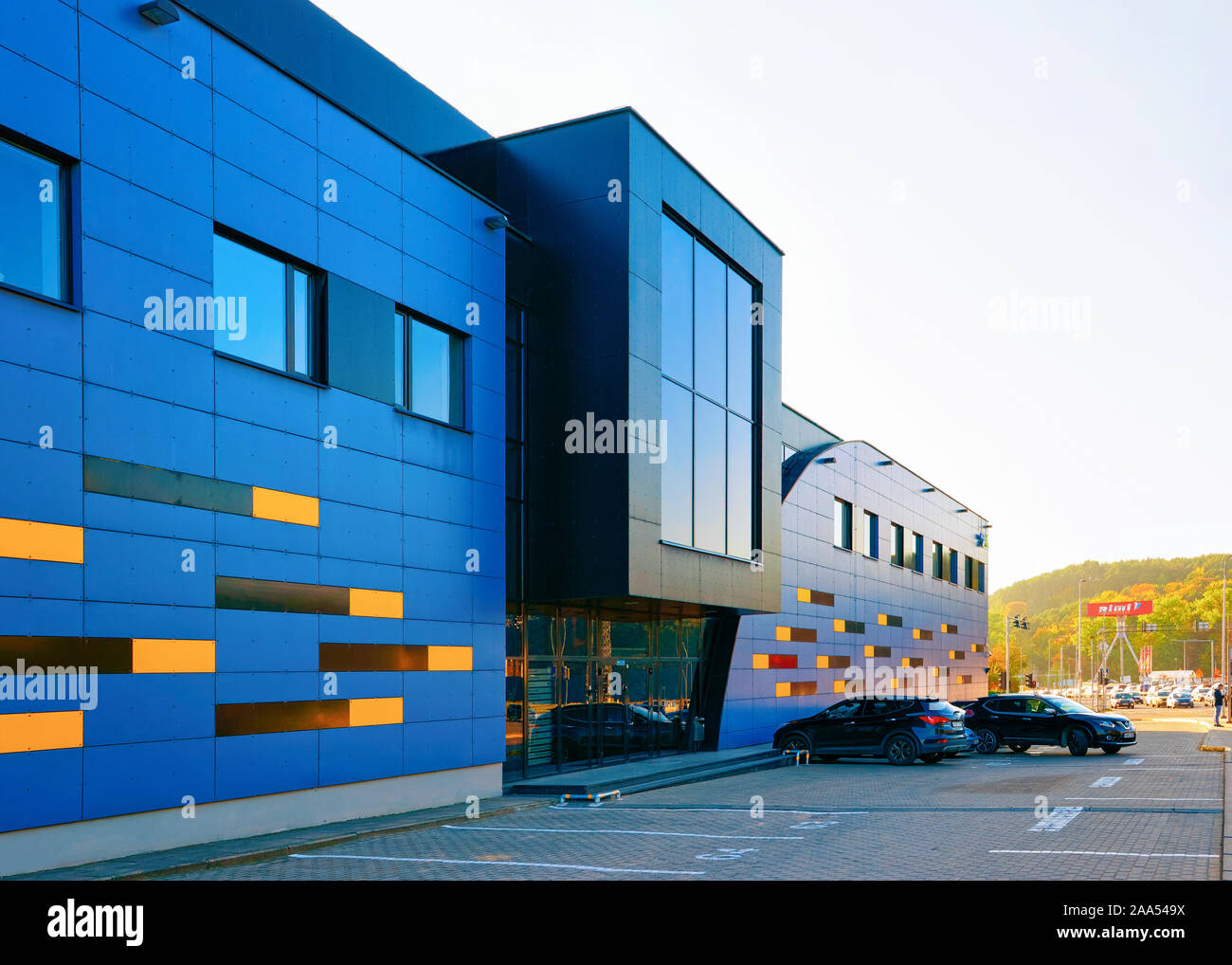 Cars parked at street Office corporate building Stock Photo - Alamy