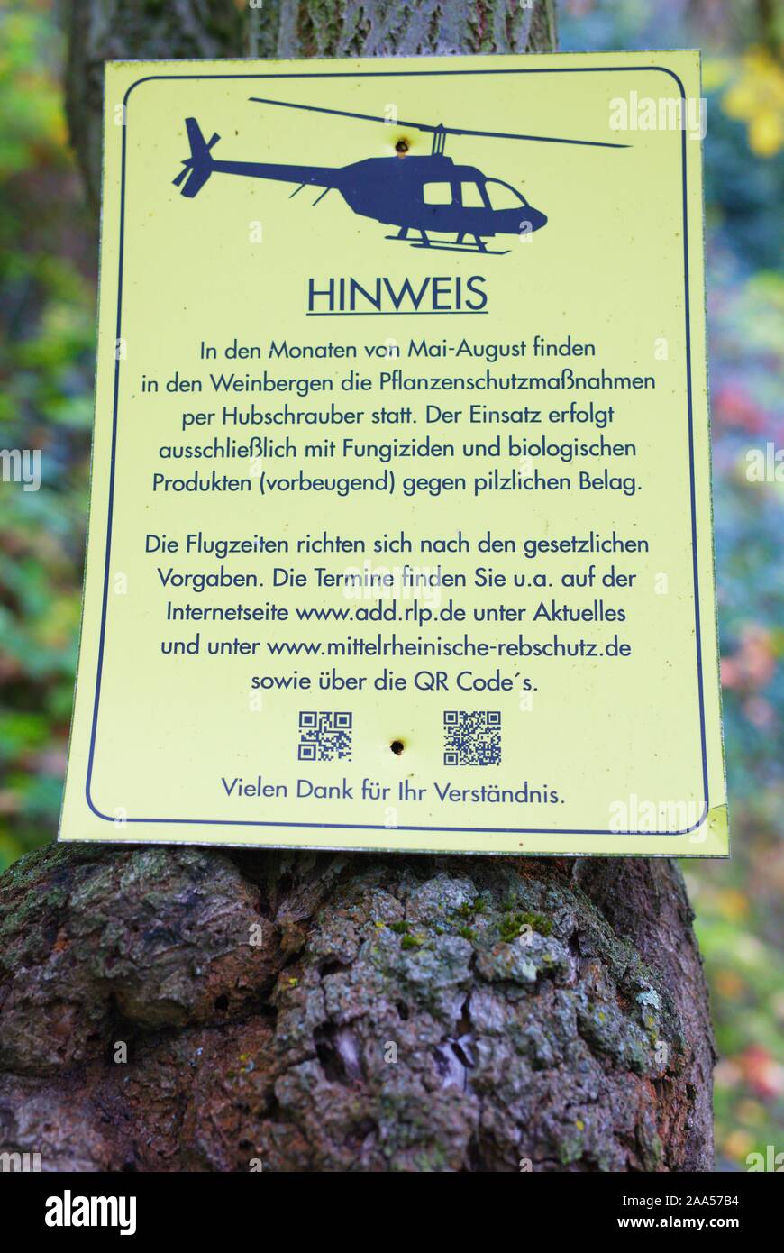 Warning sign Helicopter Spraying Stock Photo - Alamy