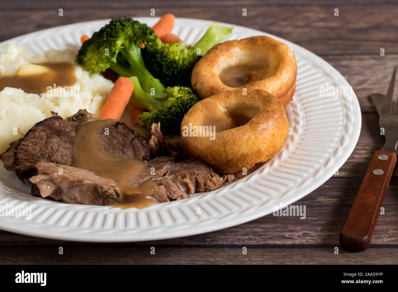 Plate of Roast beef and gravy Stock Photo - Alamy
