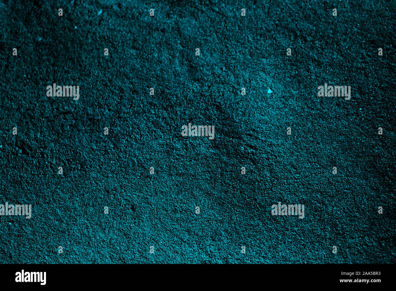 Petrol colored blurry background with textures of different shades of ...