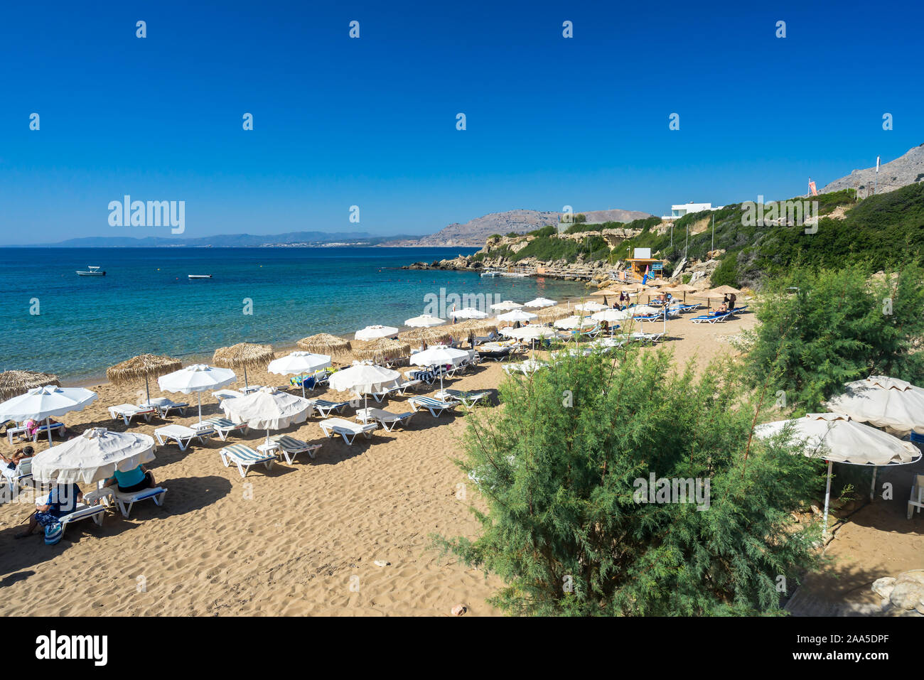 Beautiful summers day at Pefkos Beach or Pefki on the Greek Island of ...
