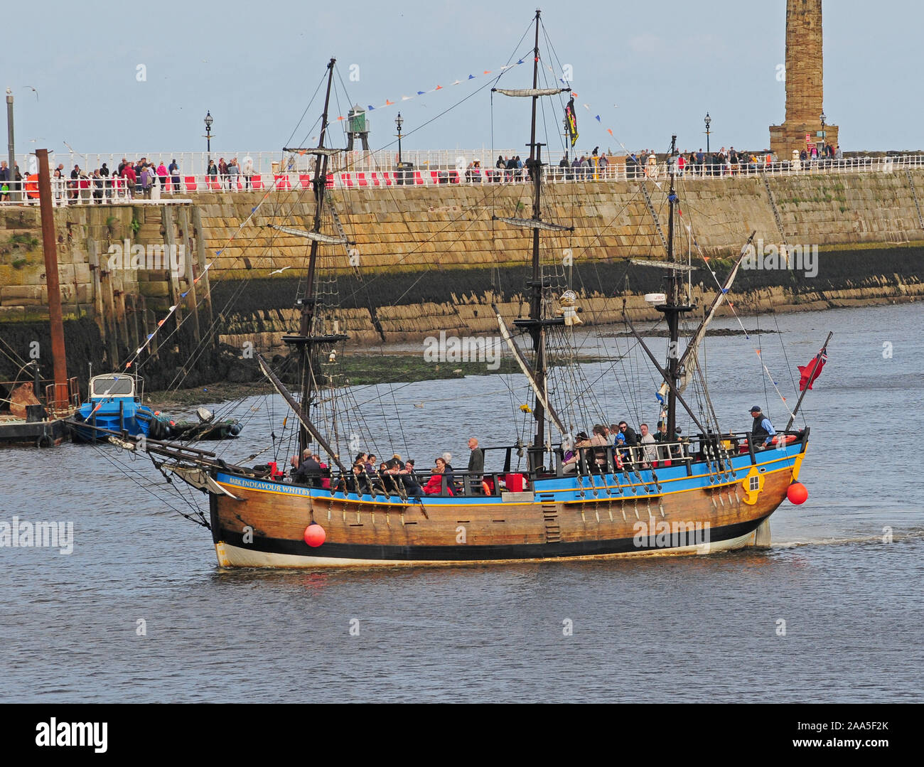 The Bark Endeavour replica coming in to Whitby Harbour Stock Photo - Alamy